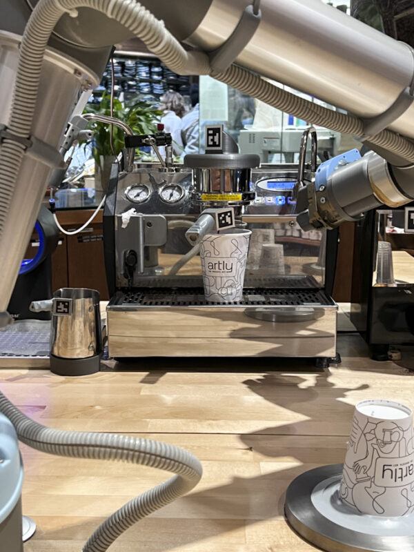 Artly robot barista can grind coffee beans, froth milk, pour latte art